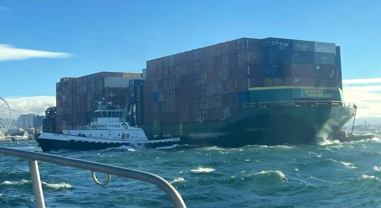 Container barge breaks free, hits pier on Seattle waterfront ...