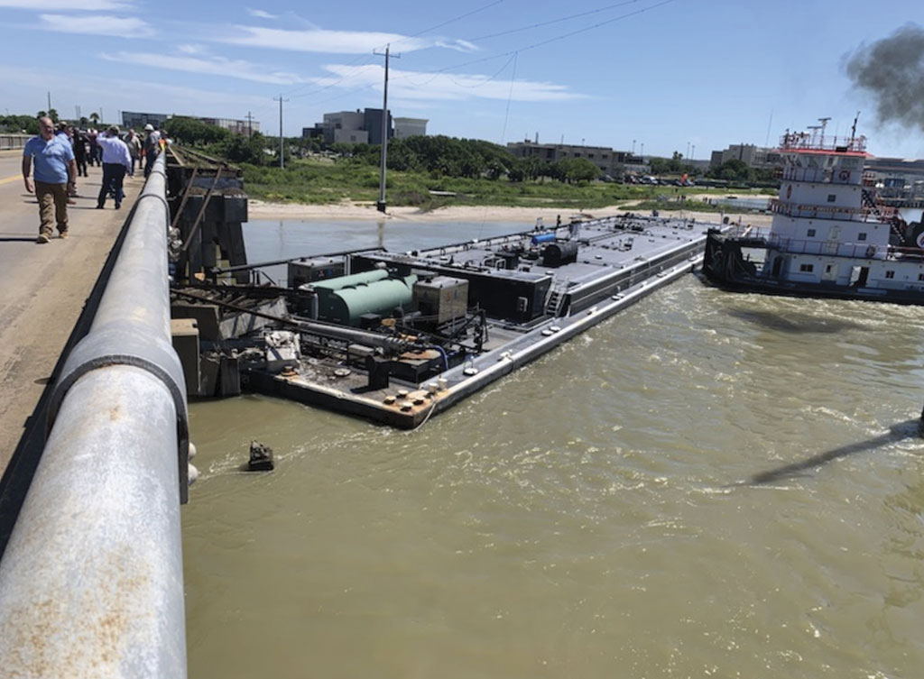 Barge breaks free from tow, strikes bridge near Galveston, Texas ...