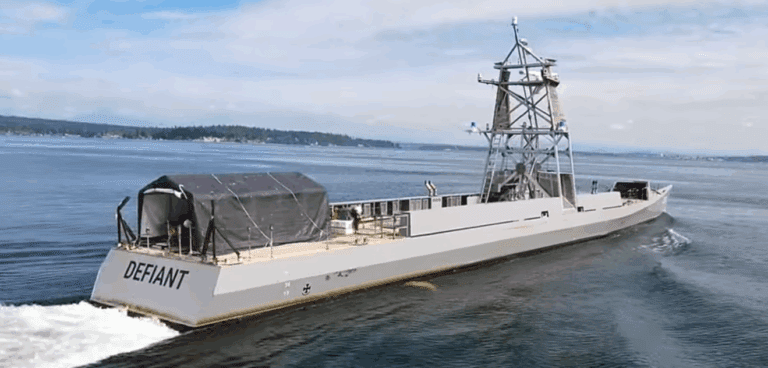 DARPA christens first Navy ship designed to sail without crew ...